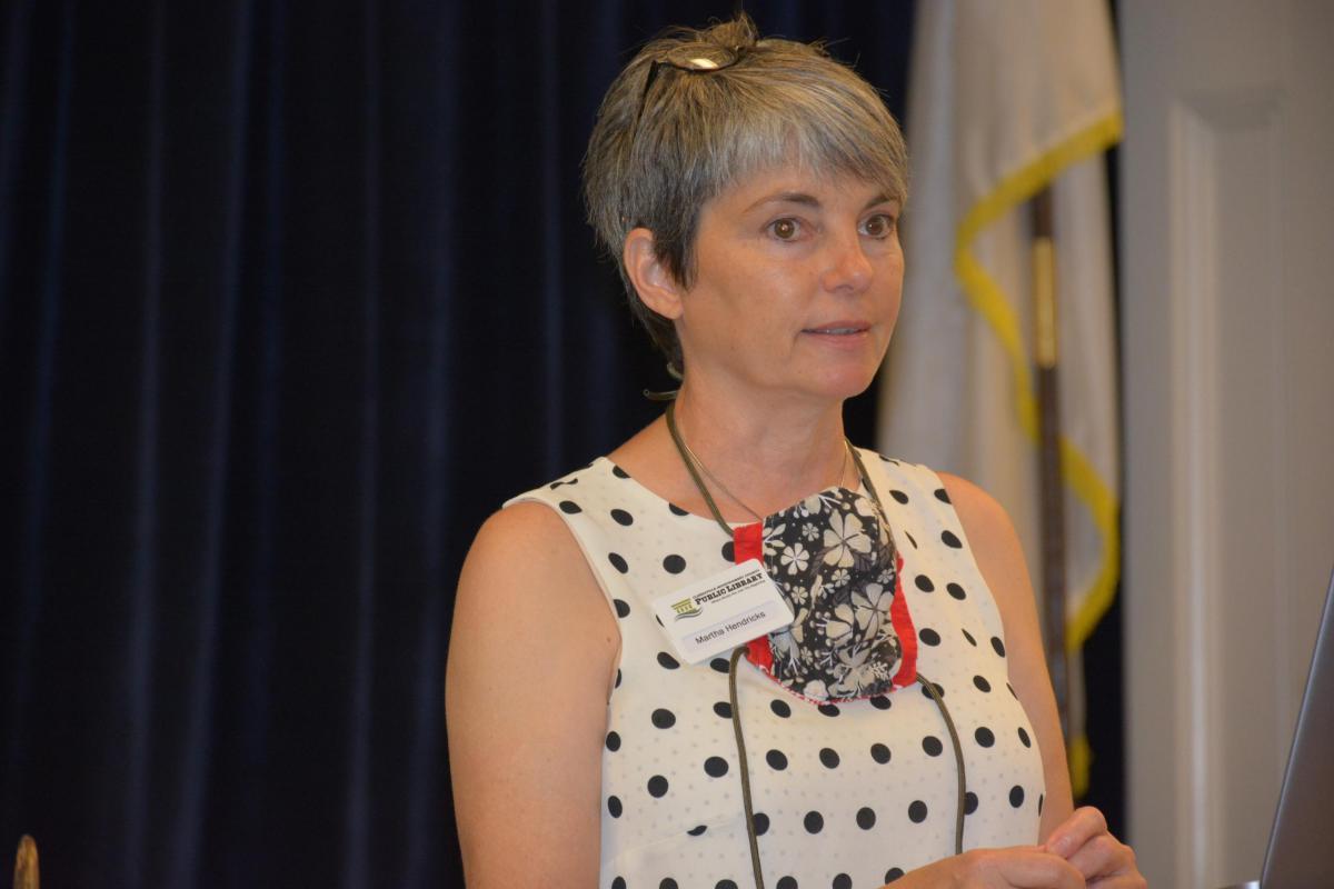 The Downtown Kiwanis Club hears an update on the public library ...
