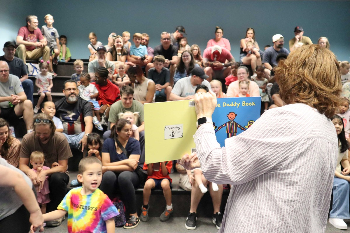 CMC Public Library hosts ‘Dads and Donuts’ event ahead of Father’s Day ...